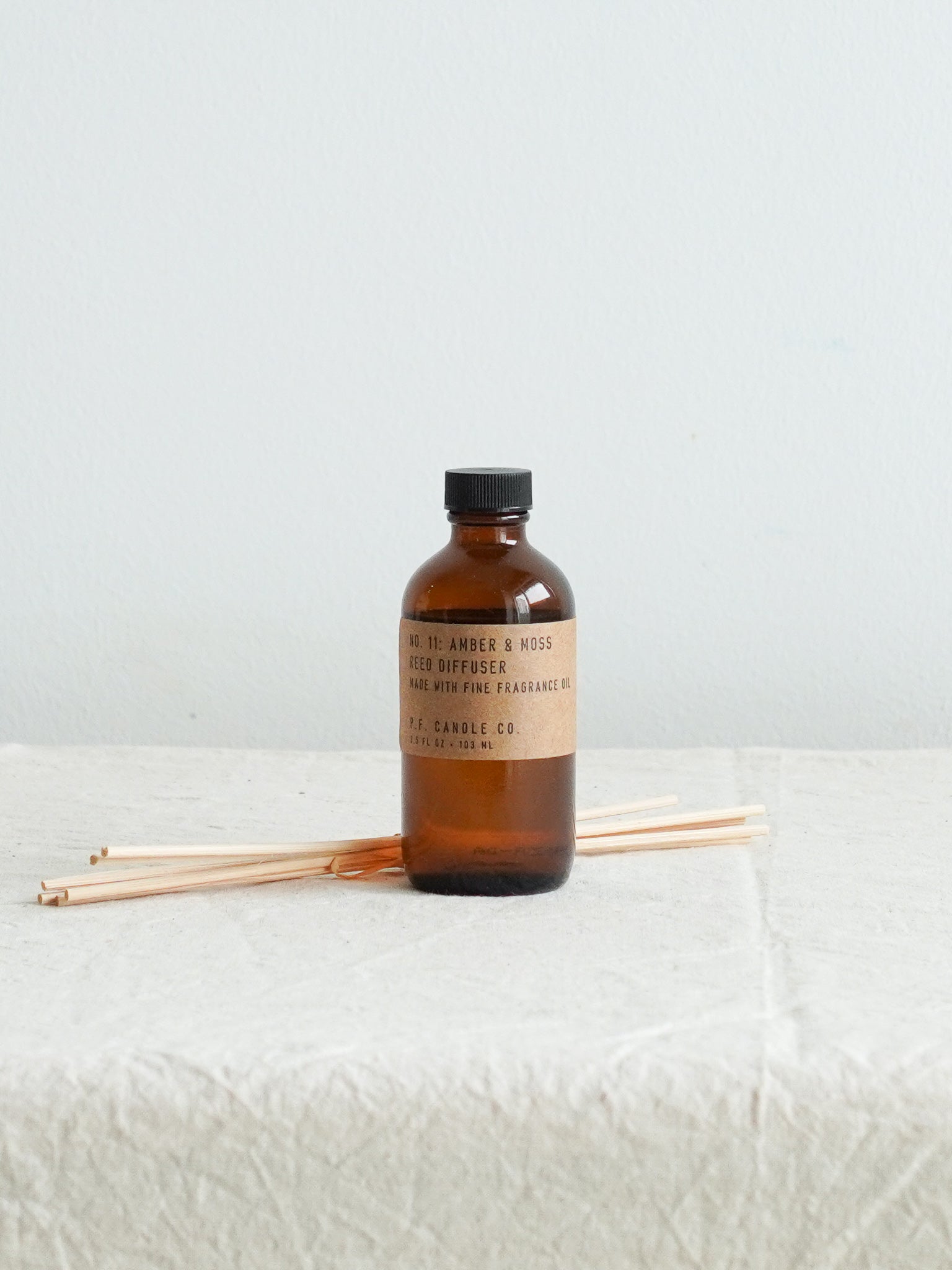 P.F. Candle Co. Reed Diffuser - Amber & Moss – Collection by Plain Vanilla